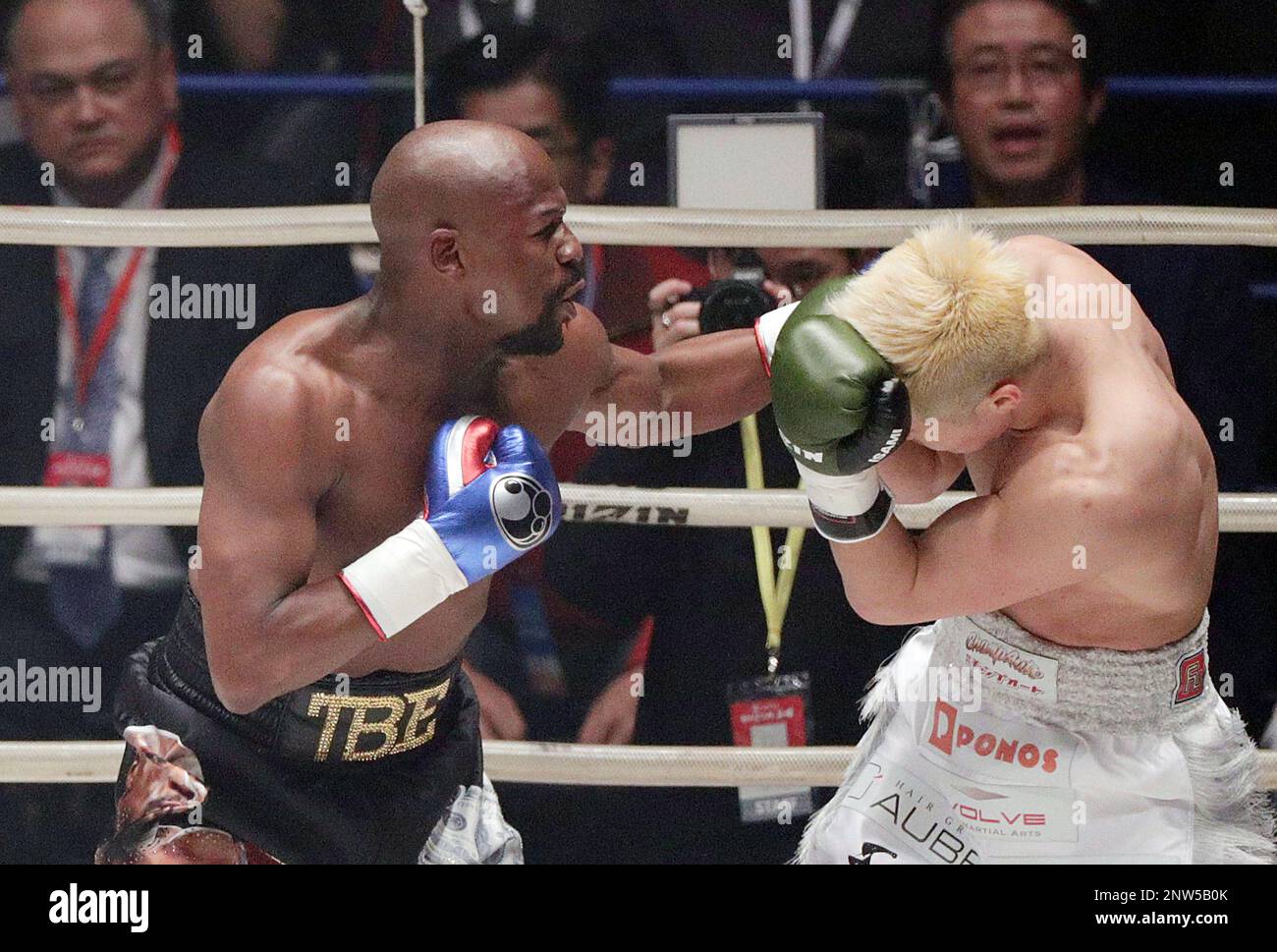 Former boxing champion Floyd Mayweather Jr. lands a punch to Japanese ...