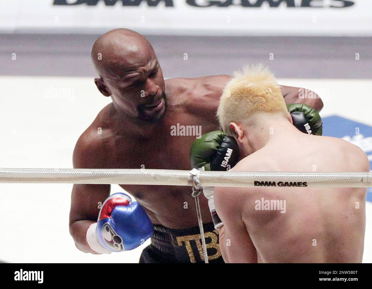 Former boxing champion Floyd Mayweather Jr. lands a punch to Japanese ...