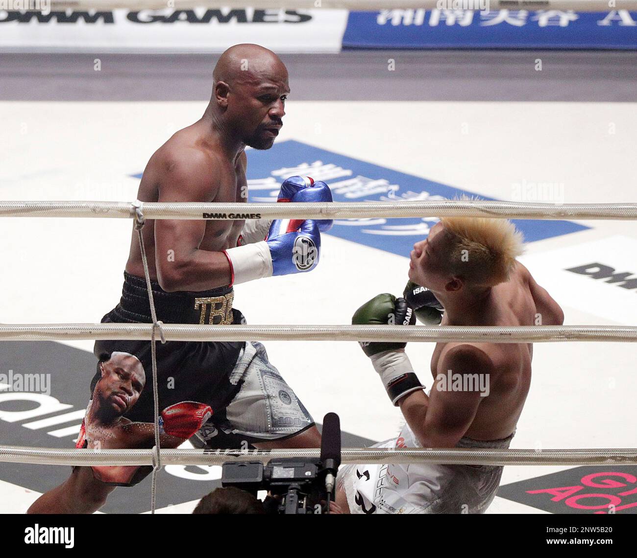 Former boxing champion Floyd Mayweather Jr. lands a punch to Japanese ...