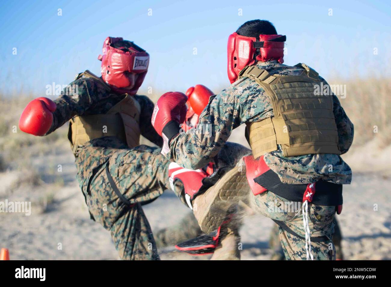 U.S. Marine Corps 1st Lt. Thomas R. Grover, left, a deputy staff judge ...