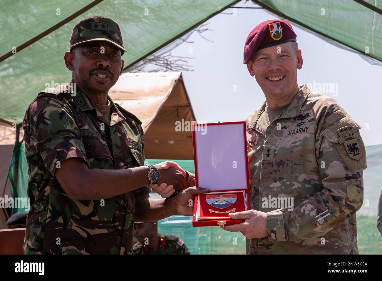 Major Gen. Juma Mwinyikai, Commanding General, Eastern Command, Kenyan Defence Forces, presents ...