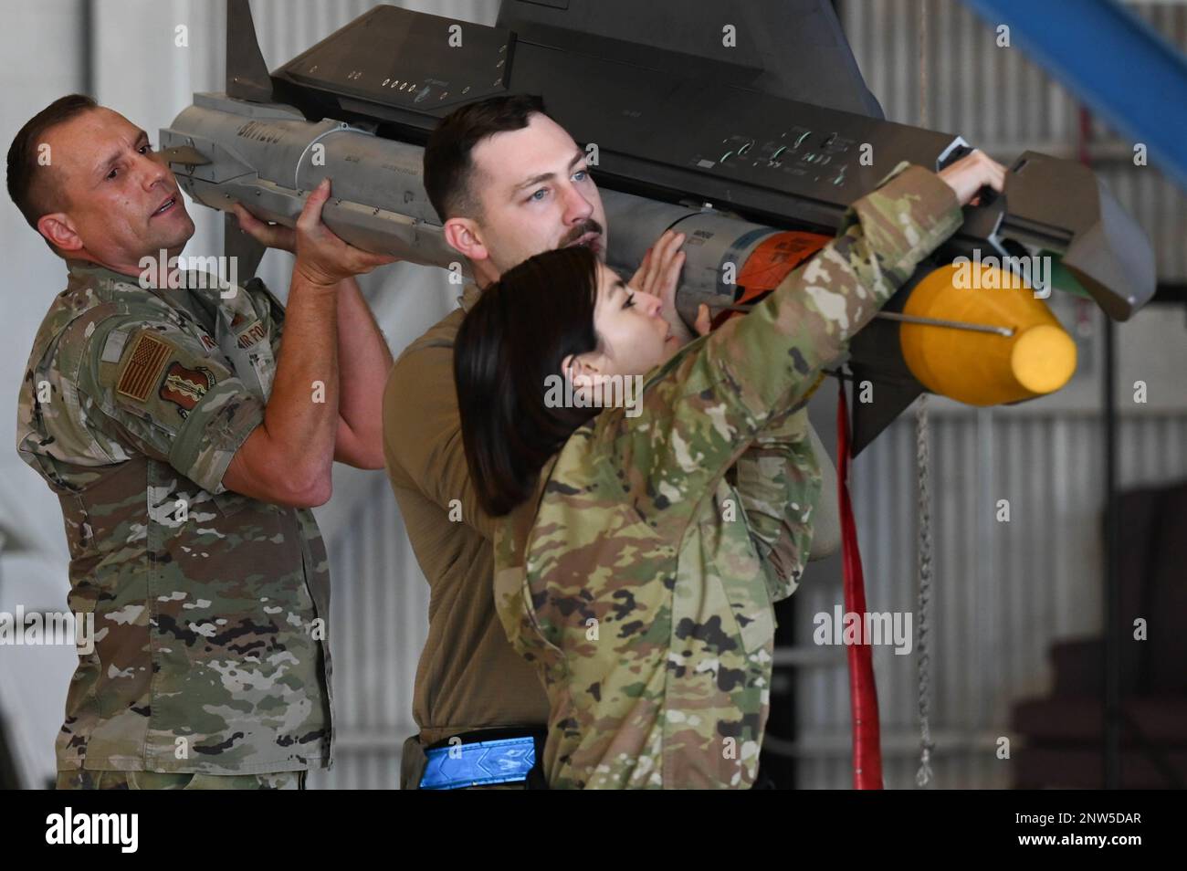 U.S. Air Force Chief Master Sgt. Shane Rose, left, command chief of the ...