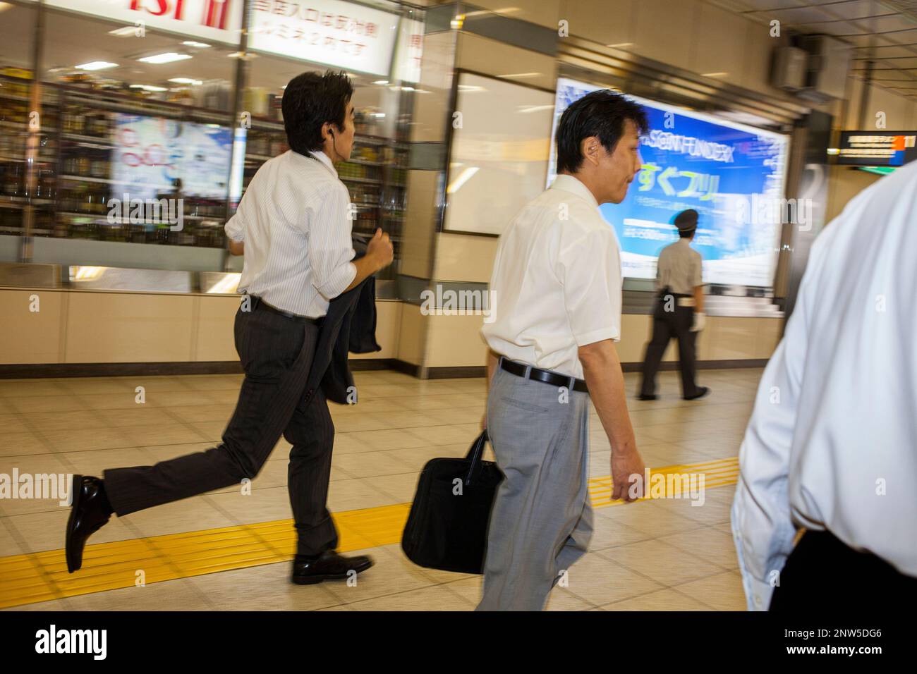 Man running,in Shinjuku Railway station.Tokyo city, Japan, Asia Stock ...