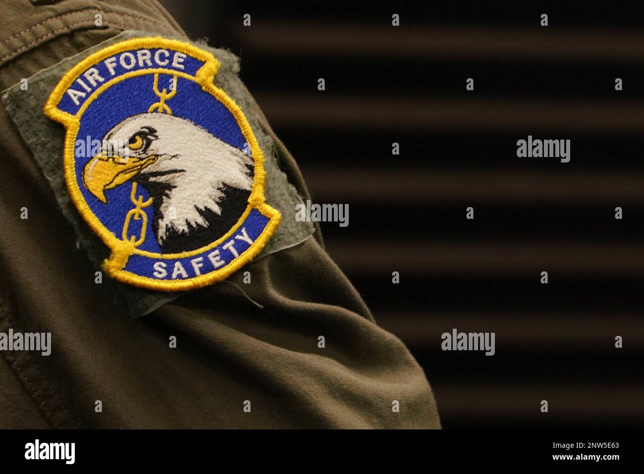 A U.S. Air Force Airman displays an Air Force Safety patch at Creech ...