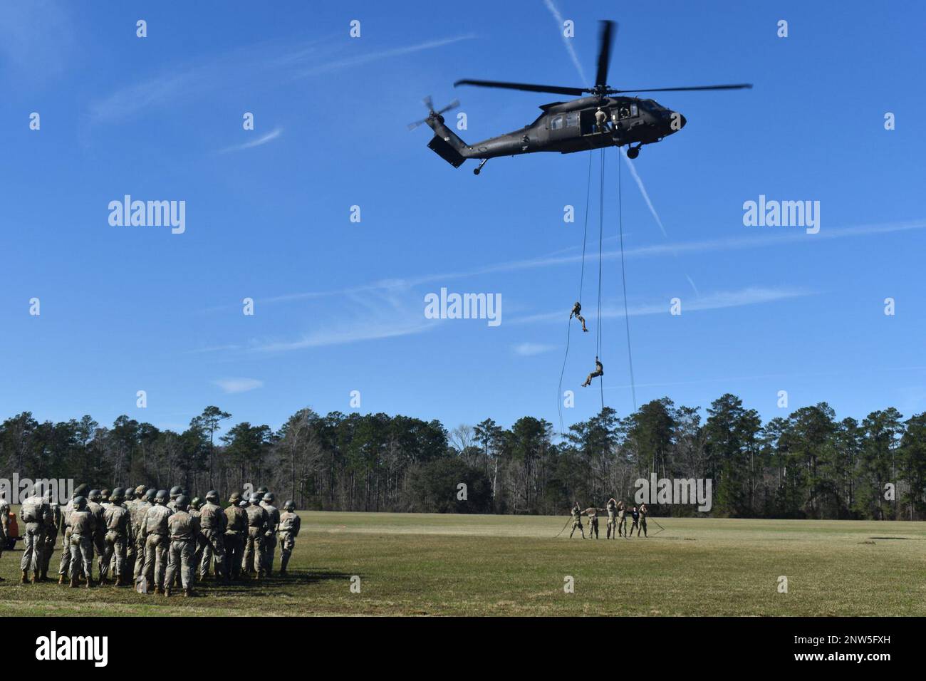 Air Assault Class 20-23 rappels from a UH-60 Black Hawk helicopter for ...