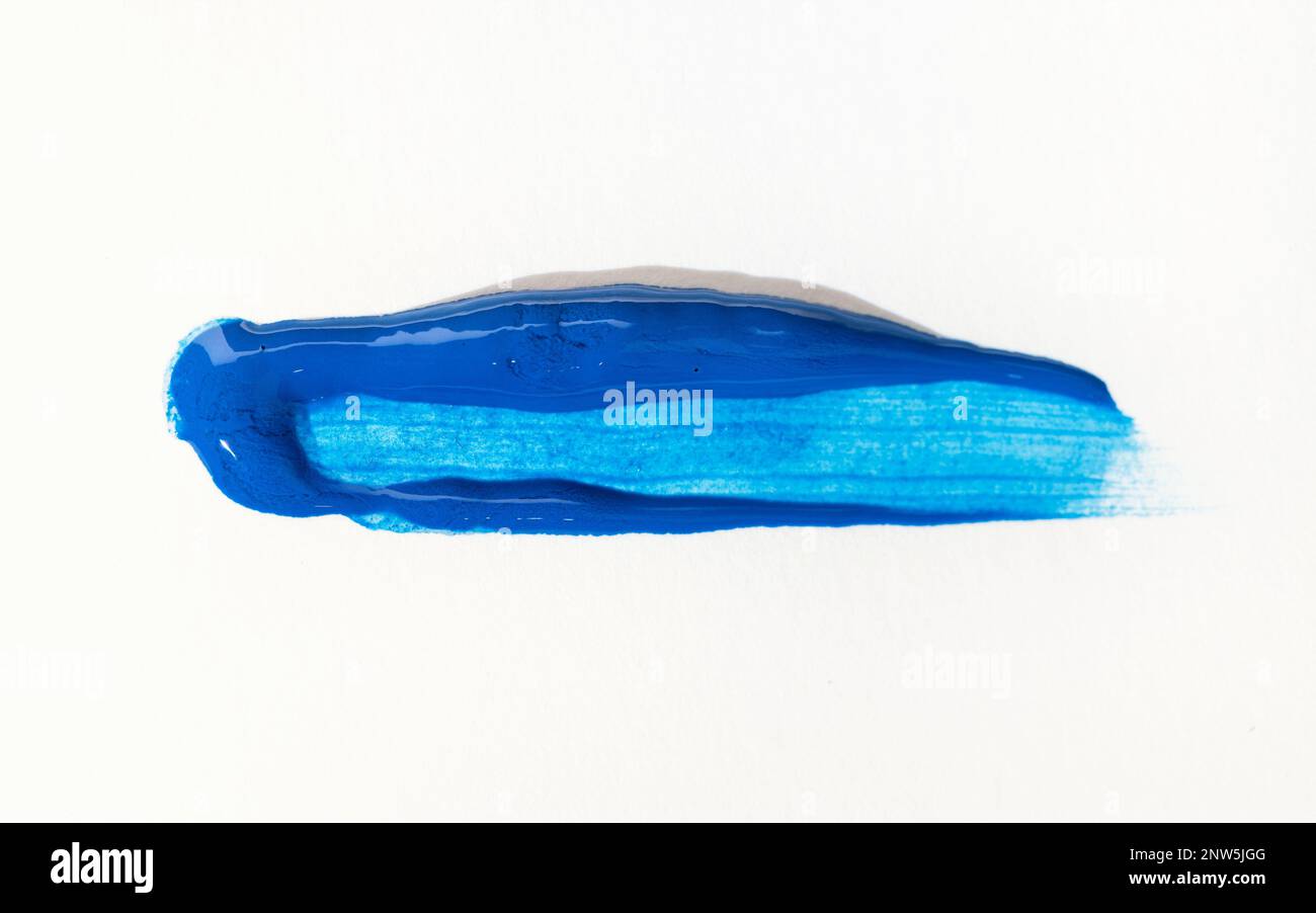 Blue paint Brush Stroke isolated on white paper canvas background Stock ...