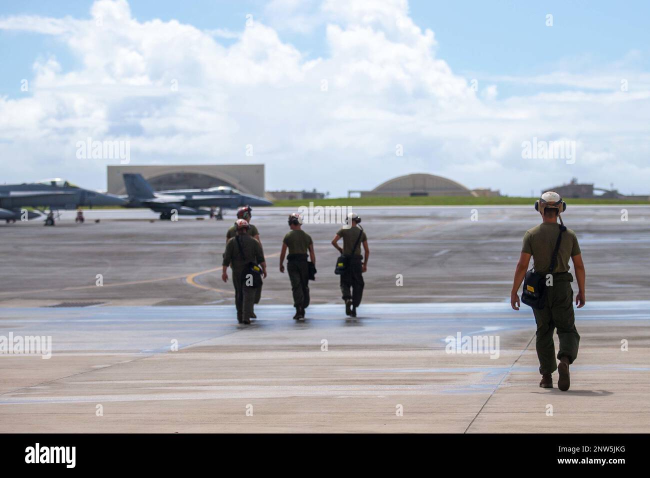 U.S. Marines with Marine Fighter Attack Squadron 312 walk out to begin ...