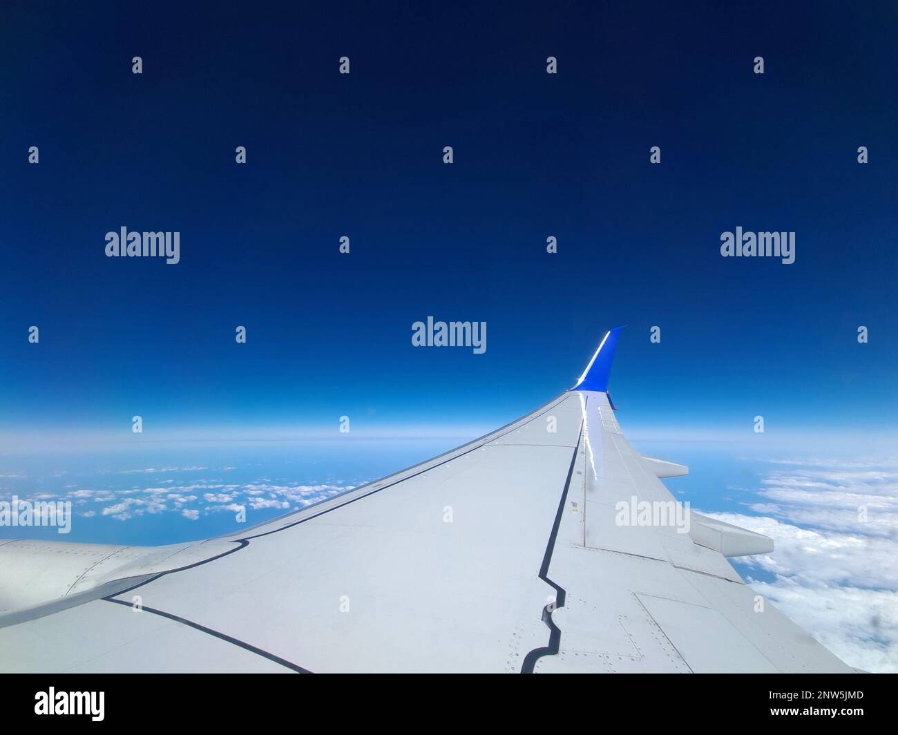 Going on airplane to vacation theme. Fly on high altitude Stock Photo ...