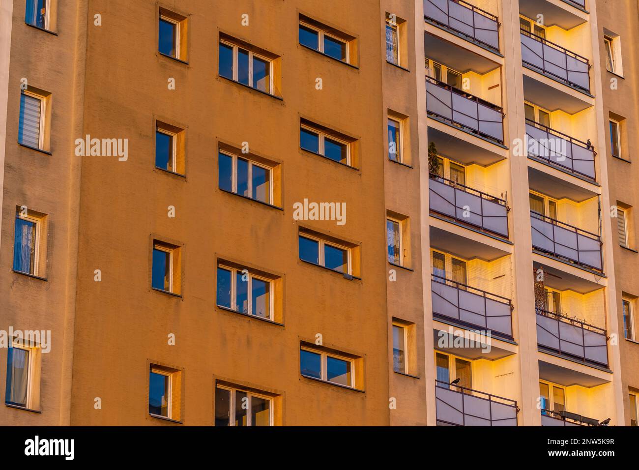Facade with balconies in an apartment block. Multi-family blocks of ...