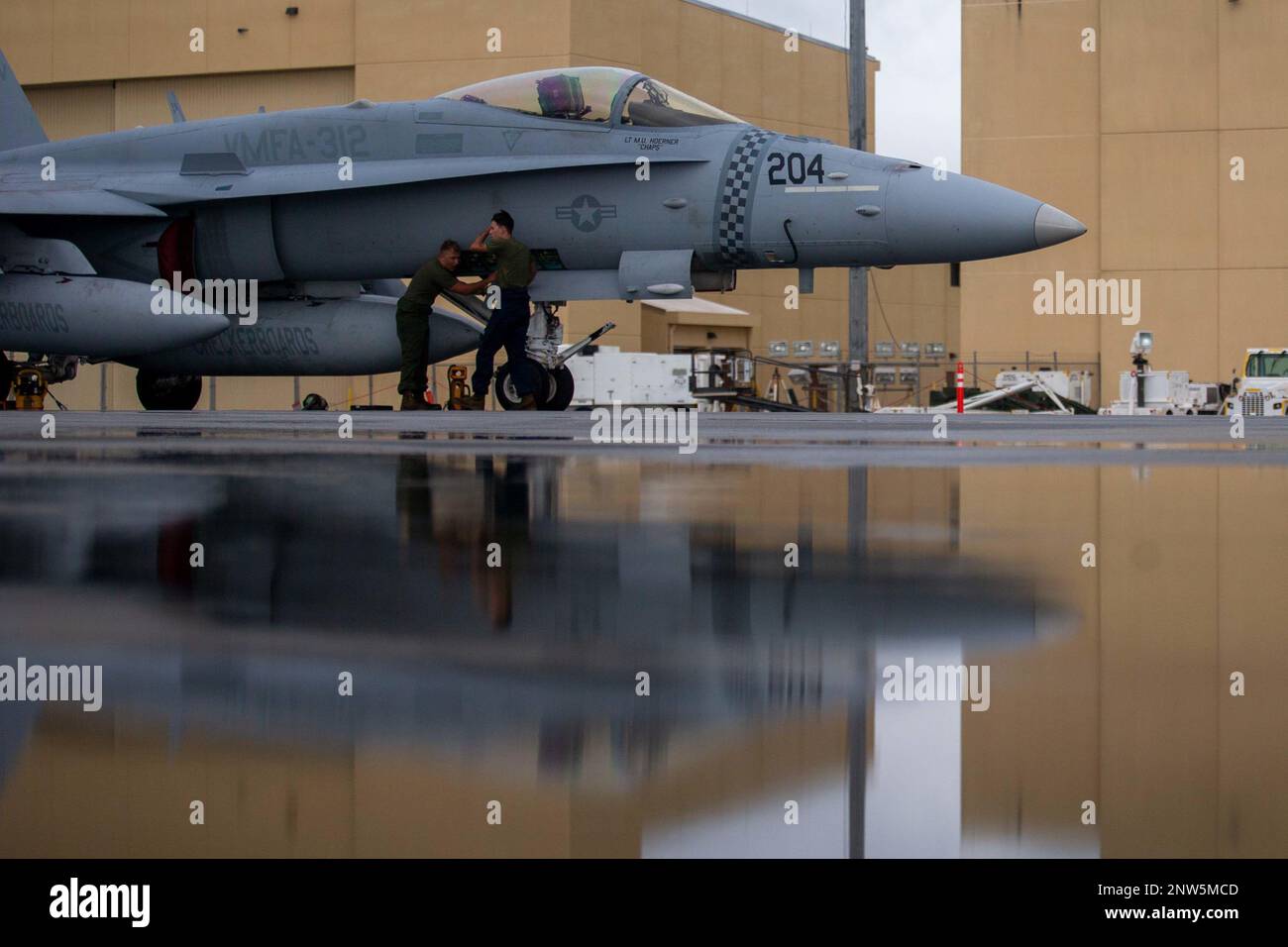 U.S. Marine Corps Cpl. Jacob Busch, left, and Lance Cpl. Roan Stevenson ...