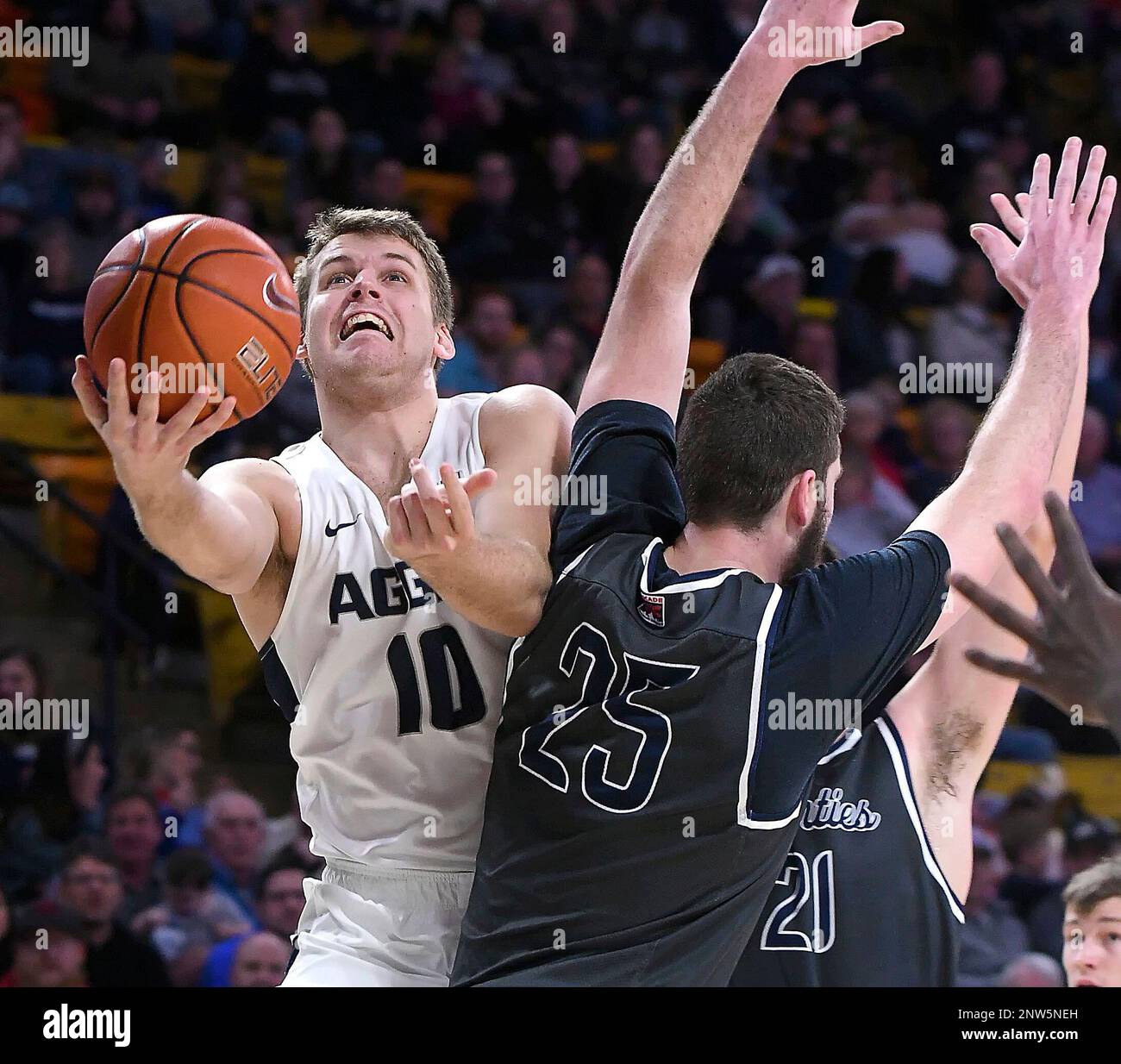 Utah State forward Quinn Taylor (10) shoots as Eastern Oregon's Jarek ...