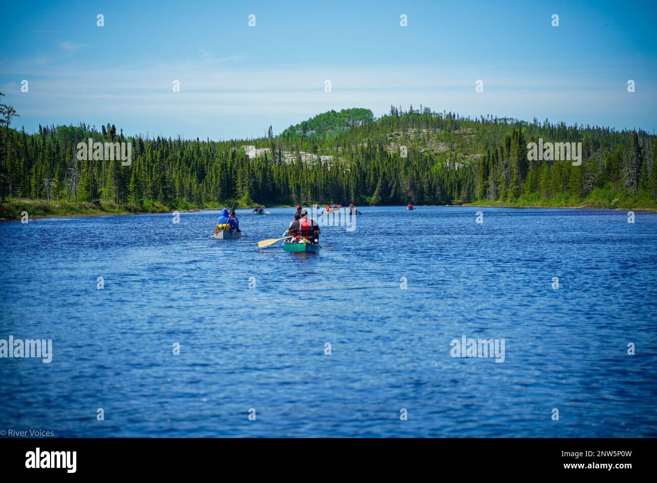 canoe adventure down Quebec river Stock Photo - Alamy