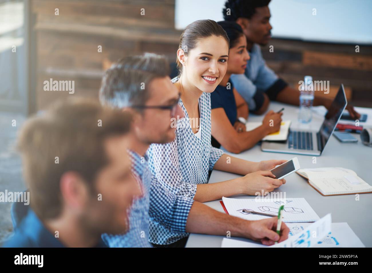 These seminars are really useful. Portrait of a young businesswoman in ...