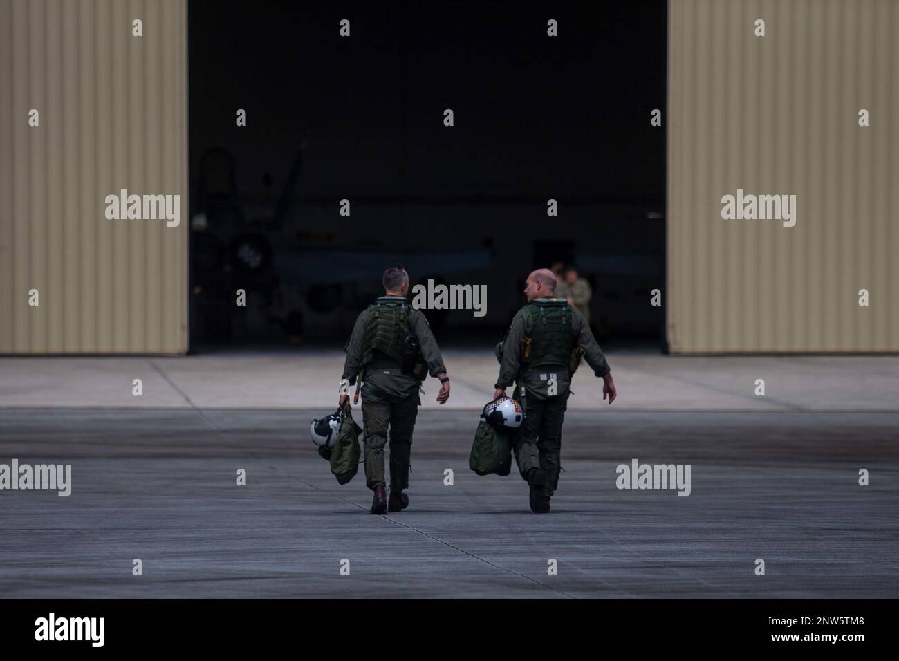 U.S. Marine Corps Brigadier Gen. George Rowell IV, left, assistant wing ...