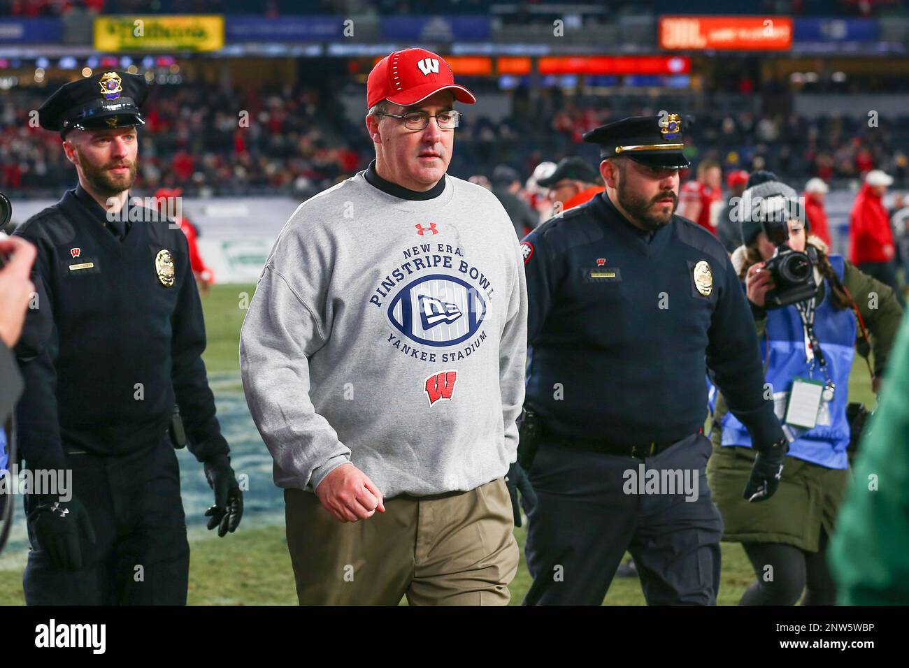 BRONX, NY - DECEMBER 27: Wisconsin Badgers head coach Paul Chryst walks ...