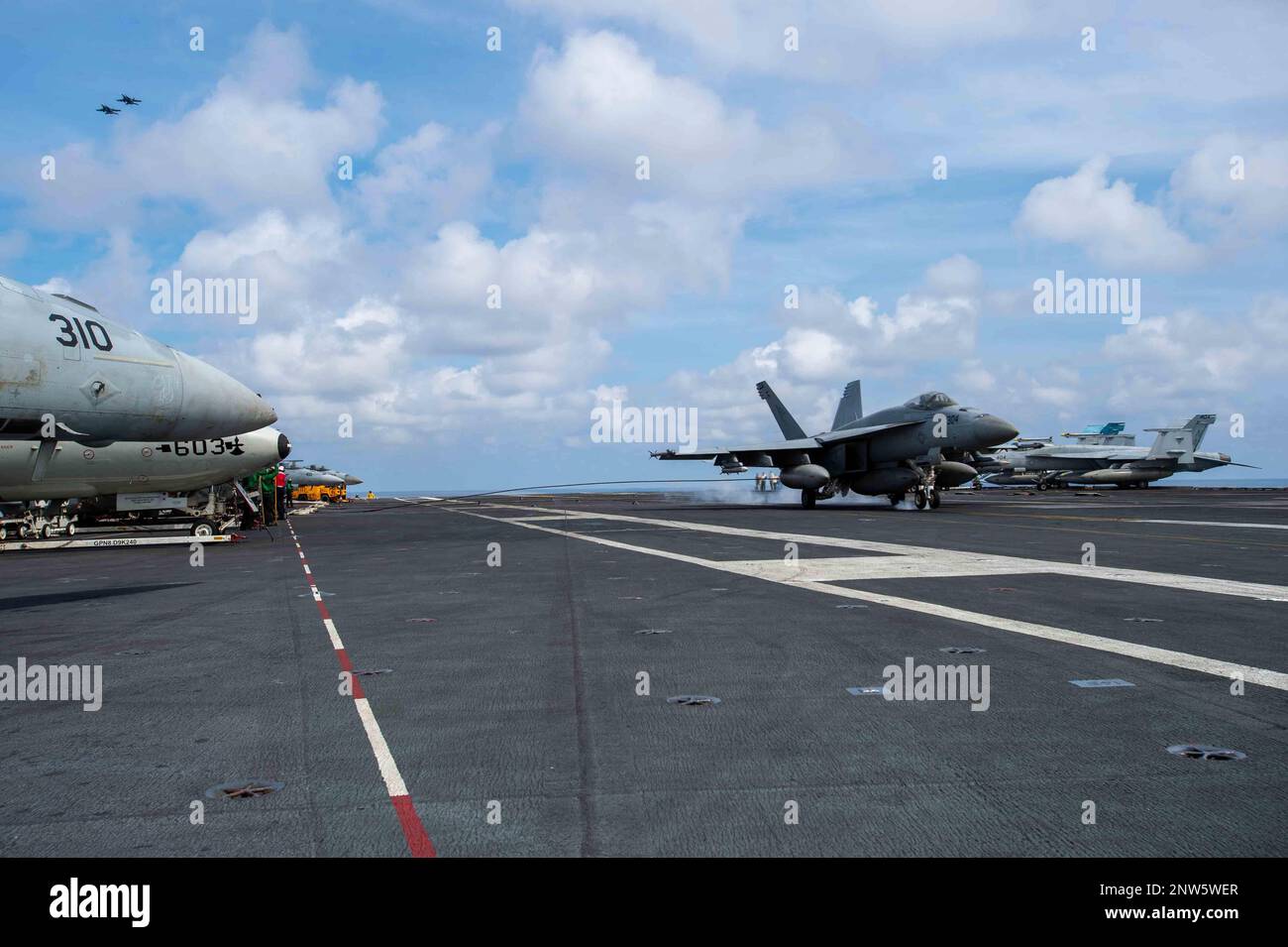 230114-N-MH015-1130 SOUTH CHINA SEA (Jan. 14, 2023) An F/A-18E Super Hornet from the “Kestrels ...