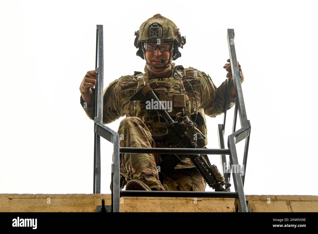 An Army advisor assigned to 1st Security Force Assistance Brigade ...