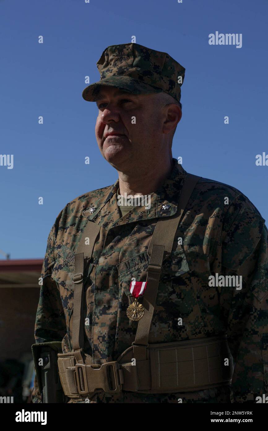 U.S. Marine Corps Lt. Col. Christopher Chase (left), the outgoing ...