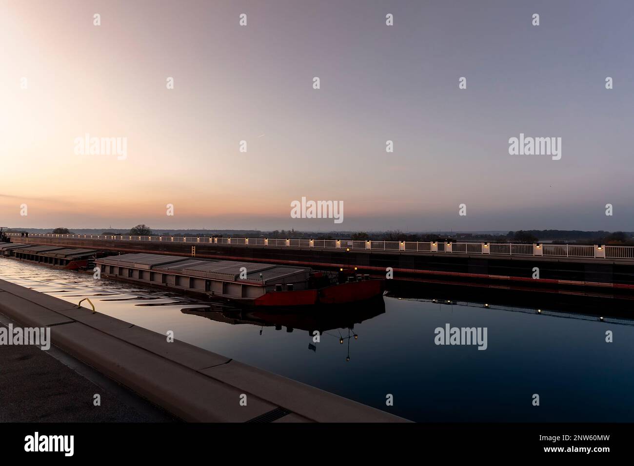 Scenic view od big cargo freight tugboat barge boat ship sailing by ...