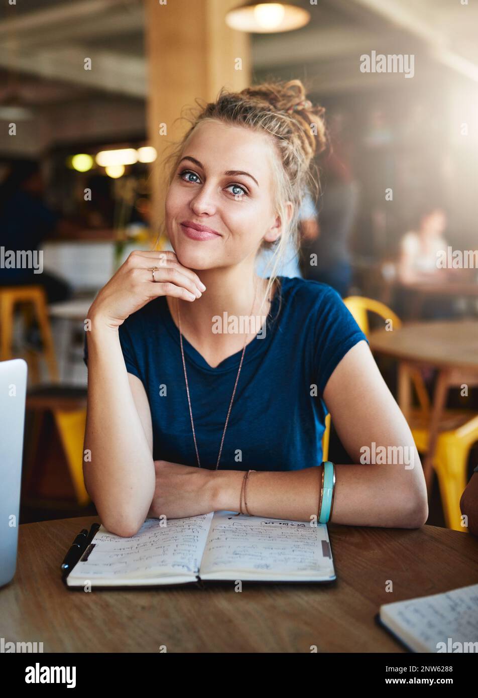 Remember, the more you learn, the more you earn. Portrait of a young ...