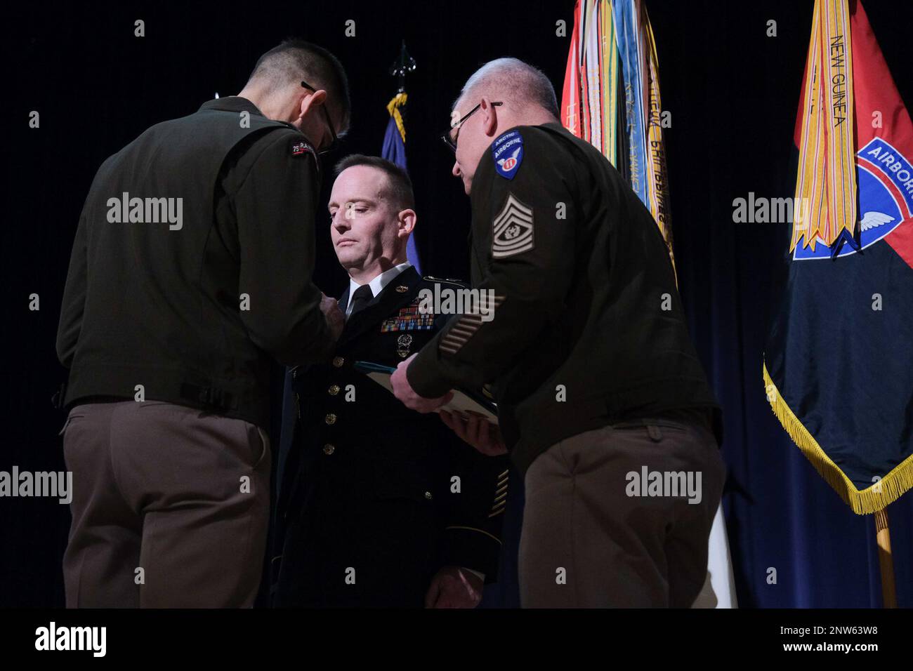 Army Sgt. 1st Class Class Andrew Chapoton (center), 11th Airborne ...