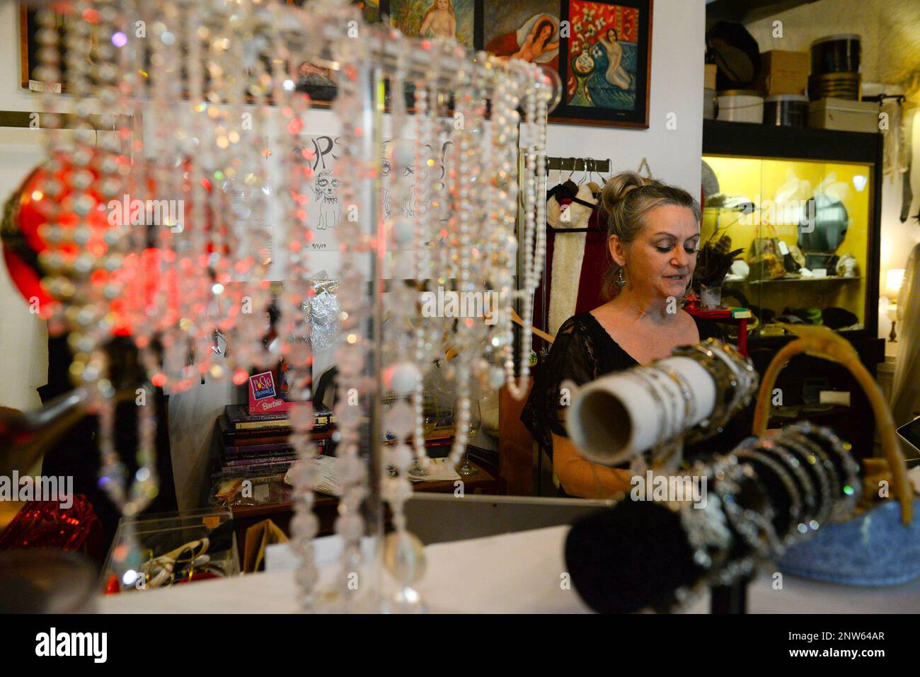 Lisa Doyle works behind the counter at her shop, Gypsy World, in the ...