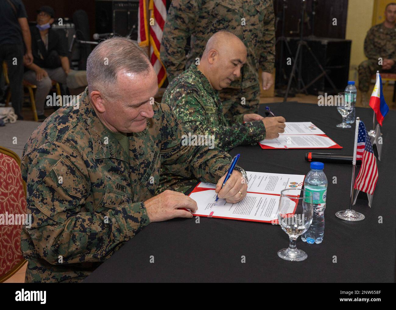 U.S. Marine Corps Lt. Gen. William M. Jurney, left, commander, U.S. Marine Corps Forces, Pacific ...