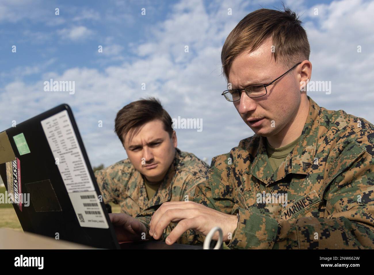 U.S. Marine Corps Lance Cpl. Clayton Fordham, left, and Cpl.Christopher ...