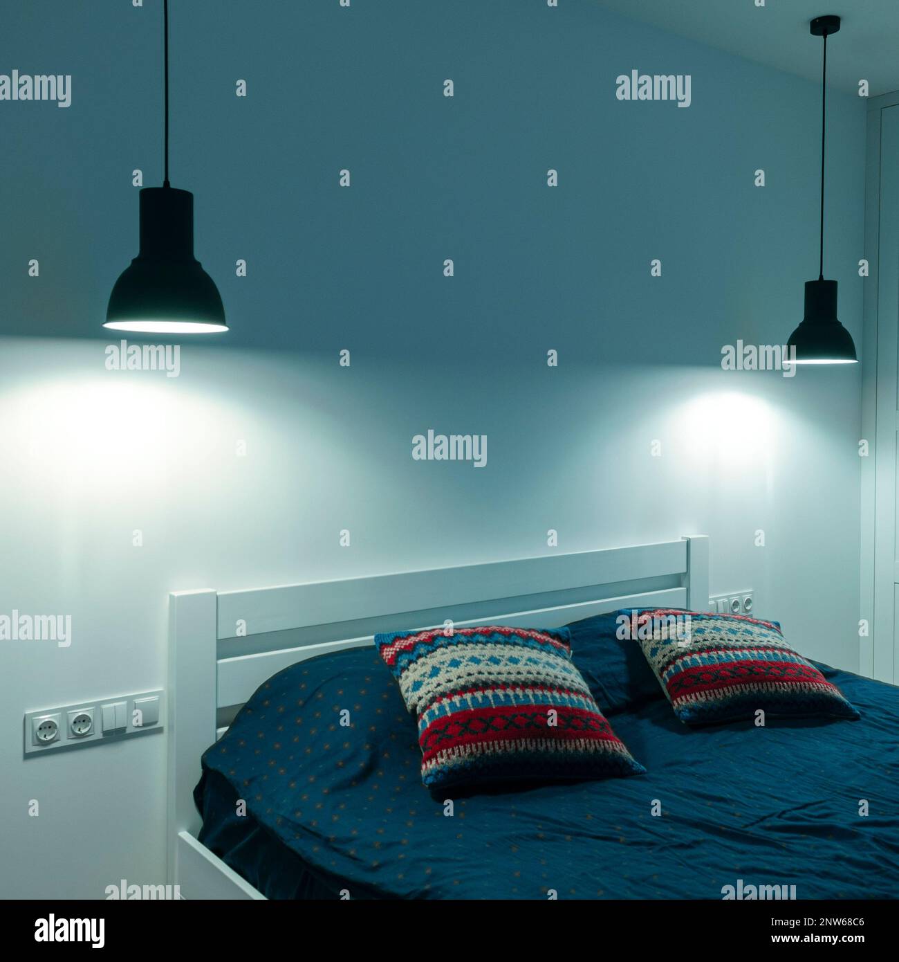 Modern and designer Scandinavian bedroom. Cozy Scandinavian tan colored ...