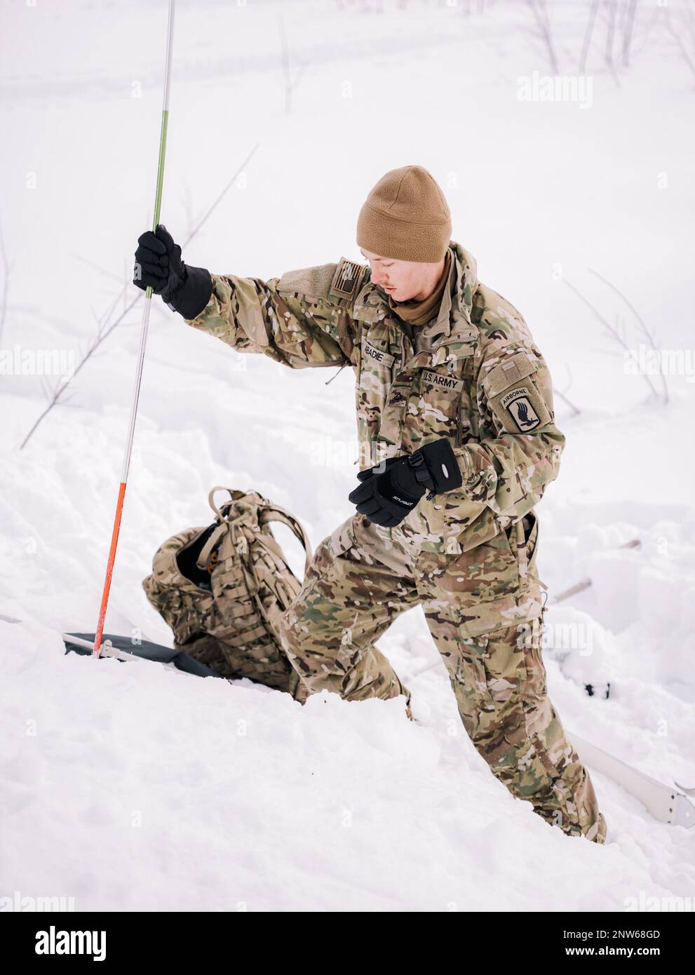 A U.S. Army Paratrooper assigned to the 173rd Airborne Brigade uses a ...