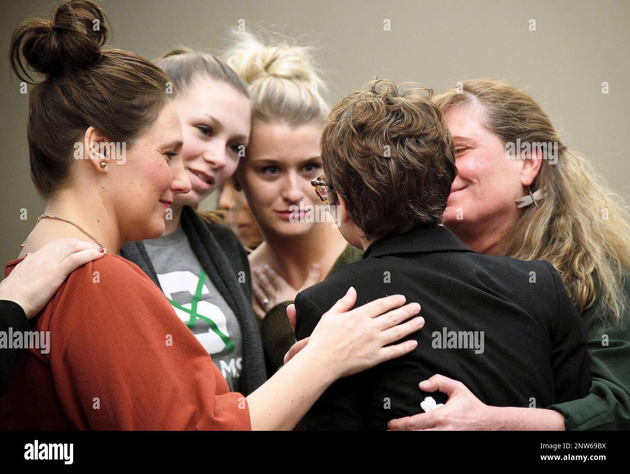 FILE - In this Jan. 19, 2018, file photo, Morgan McCaul gets hugs from ...