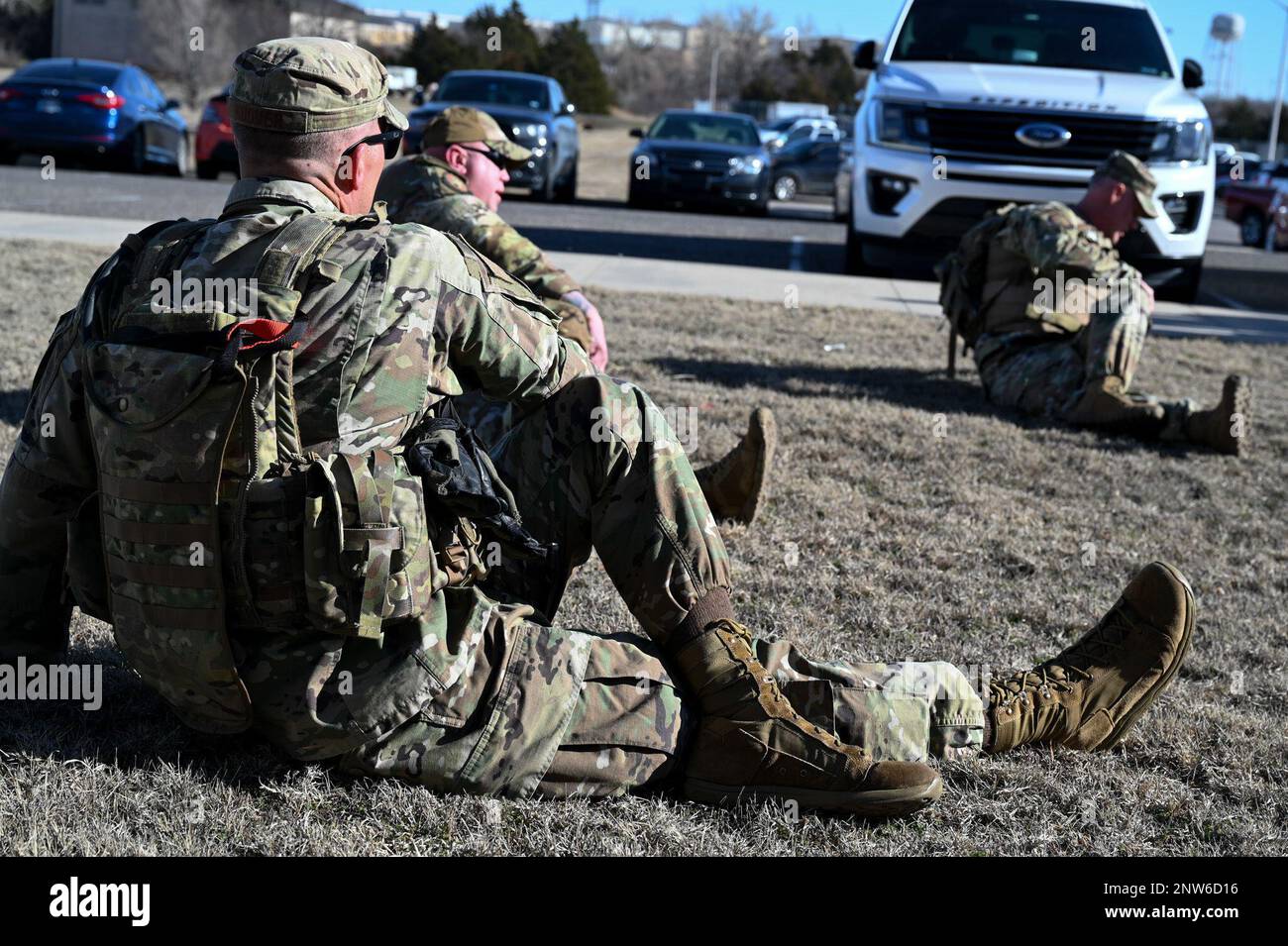 Members of the 507th Security Forces Squadron stretch prior to training for the Bataan Memorial ...