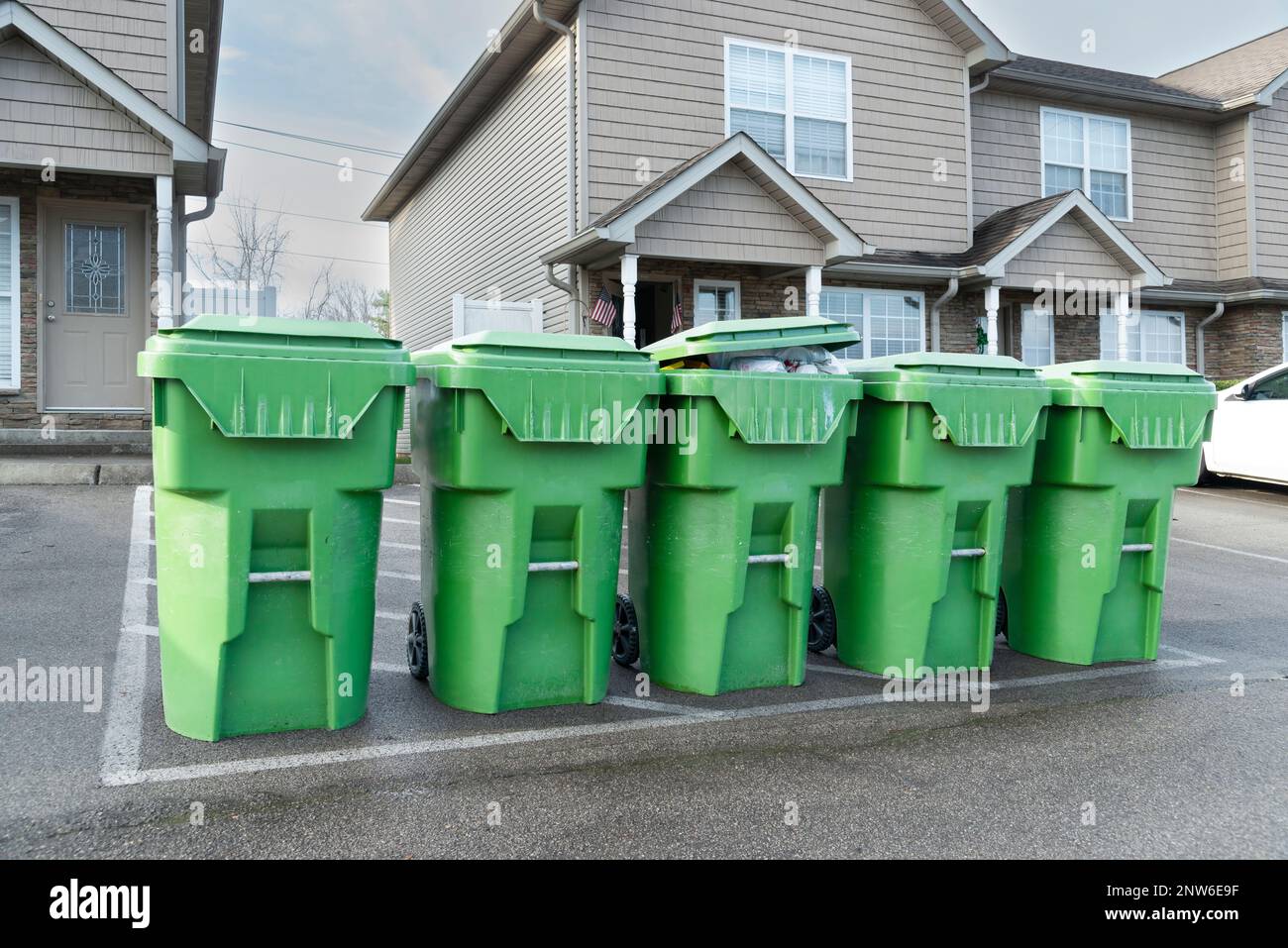 Horizontal shot of condo trash bins waiting for a dump truck Stock ...