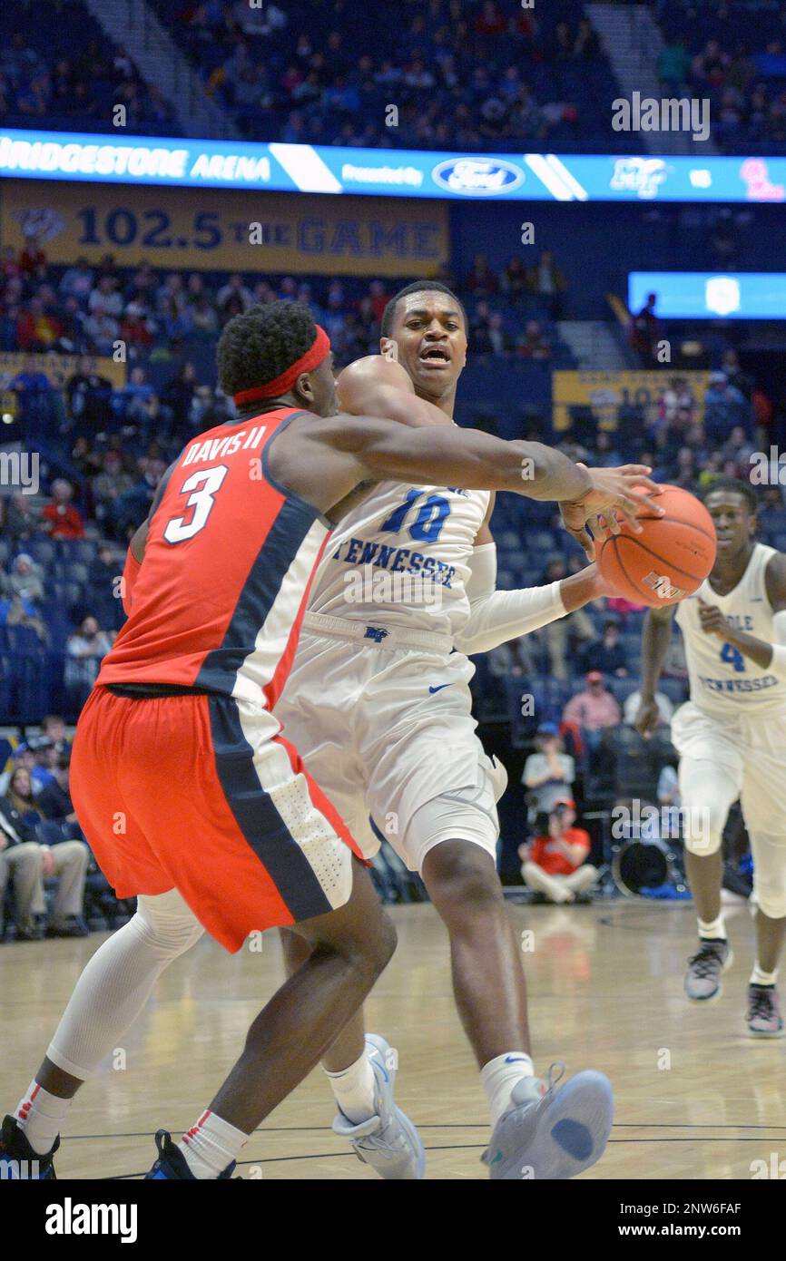 Middle Tennessee Blue Raiders guard Jayce Johnson (10) is defended by ...