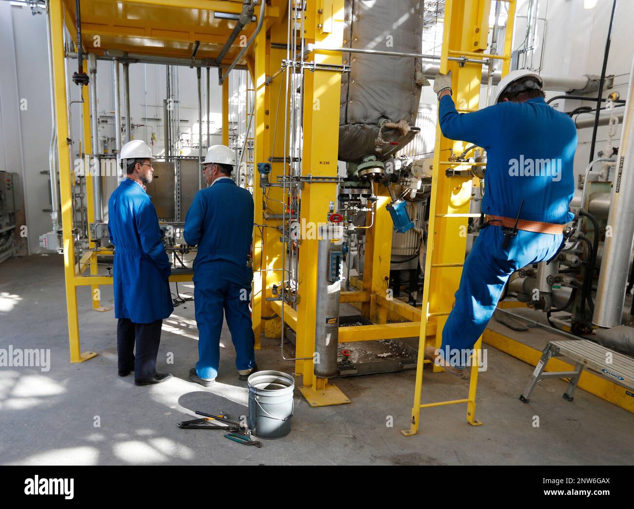 Chemists from left, Andres Sustic, and Enrico Buenacosa at the Pilot ...