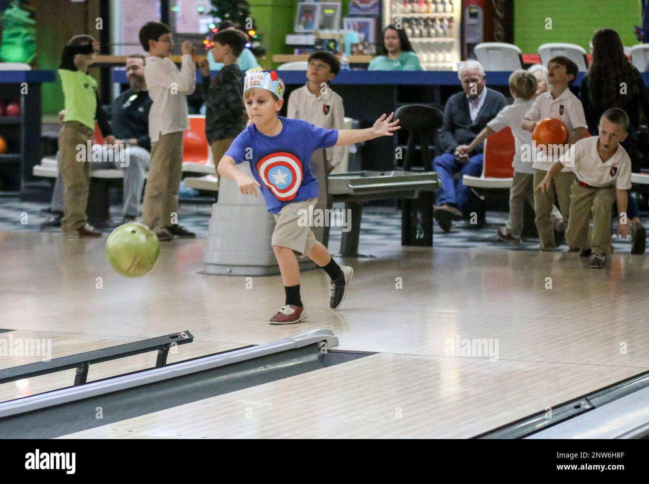 In this Thursday, Dec. 20, 2018 photo, Ethan Bass releases the ball ...