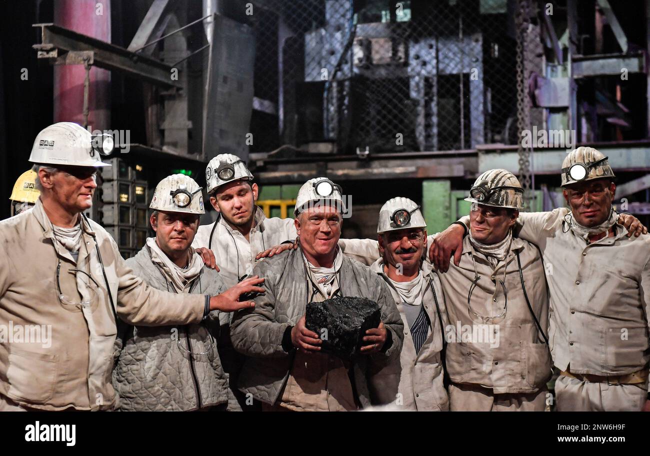 Miners hold the last lump of coal during a closing ceremony of the last ...