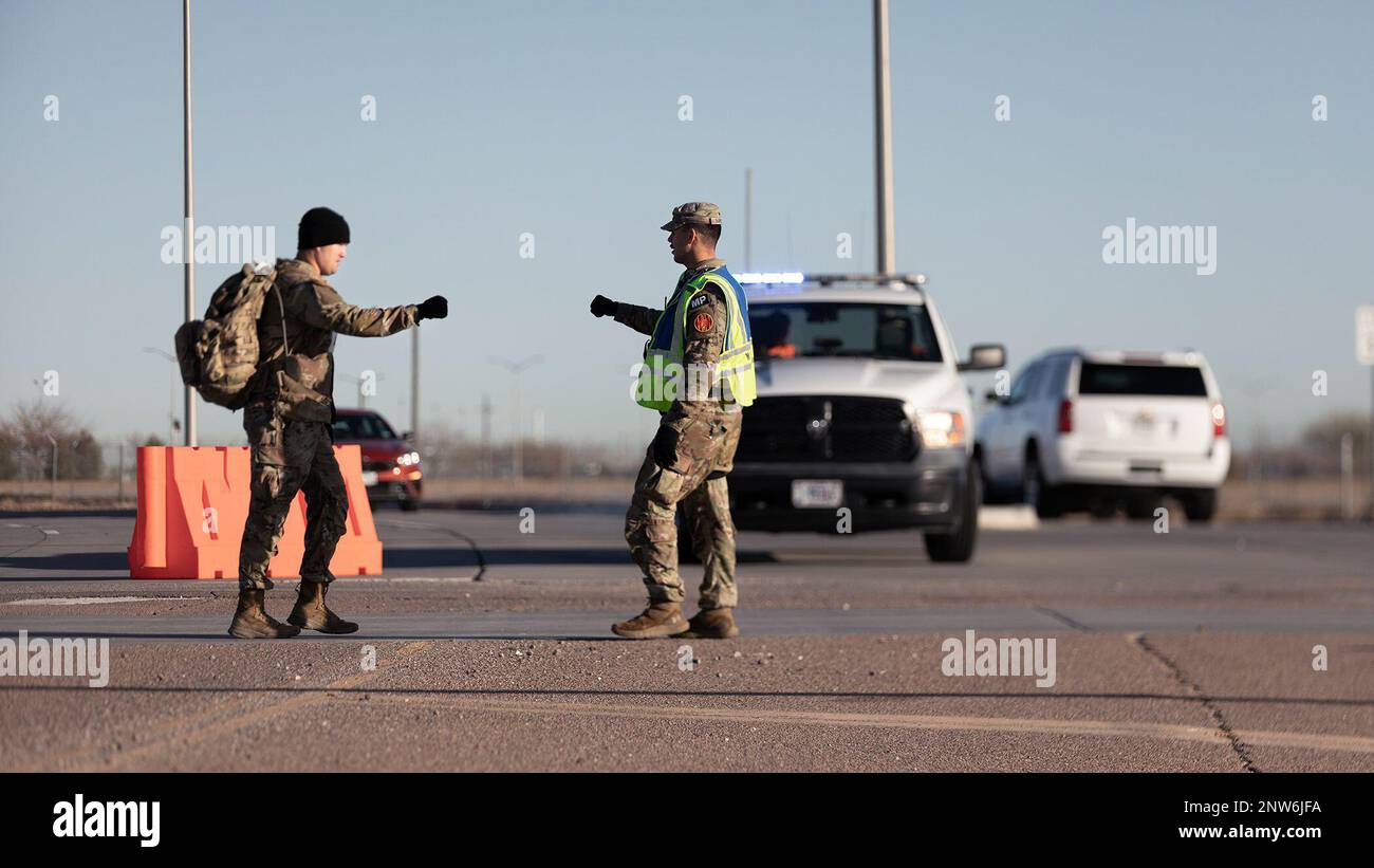 A 93rd Military Police Battalion Soldier conducting road safety has a ...