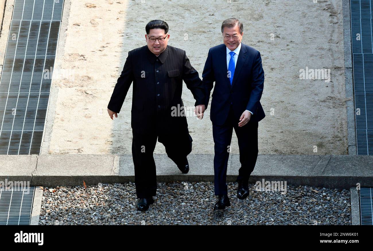 North Korean leader Kim Jong Un, left, and South Korean President Moon ...