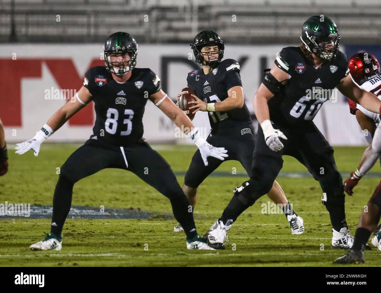 Ohio Bobcats quarterback Nathan Rourke (12) looks downfield during the ...