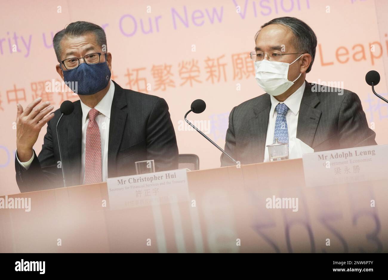 Financial Secretary Paul Chan Mo-po (left) and Secretary for Financial ...