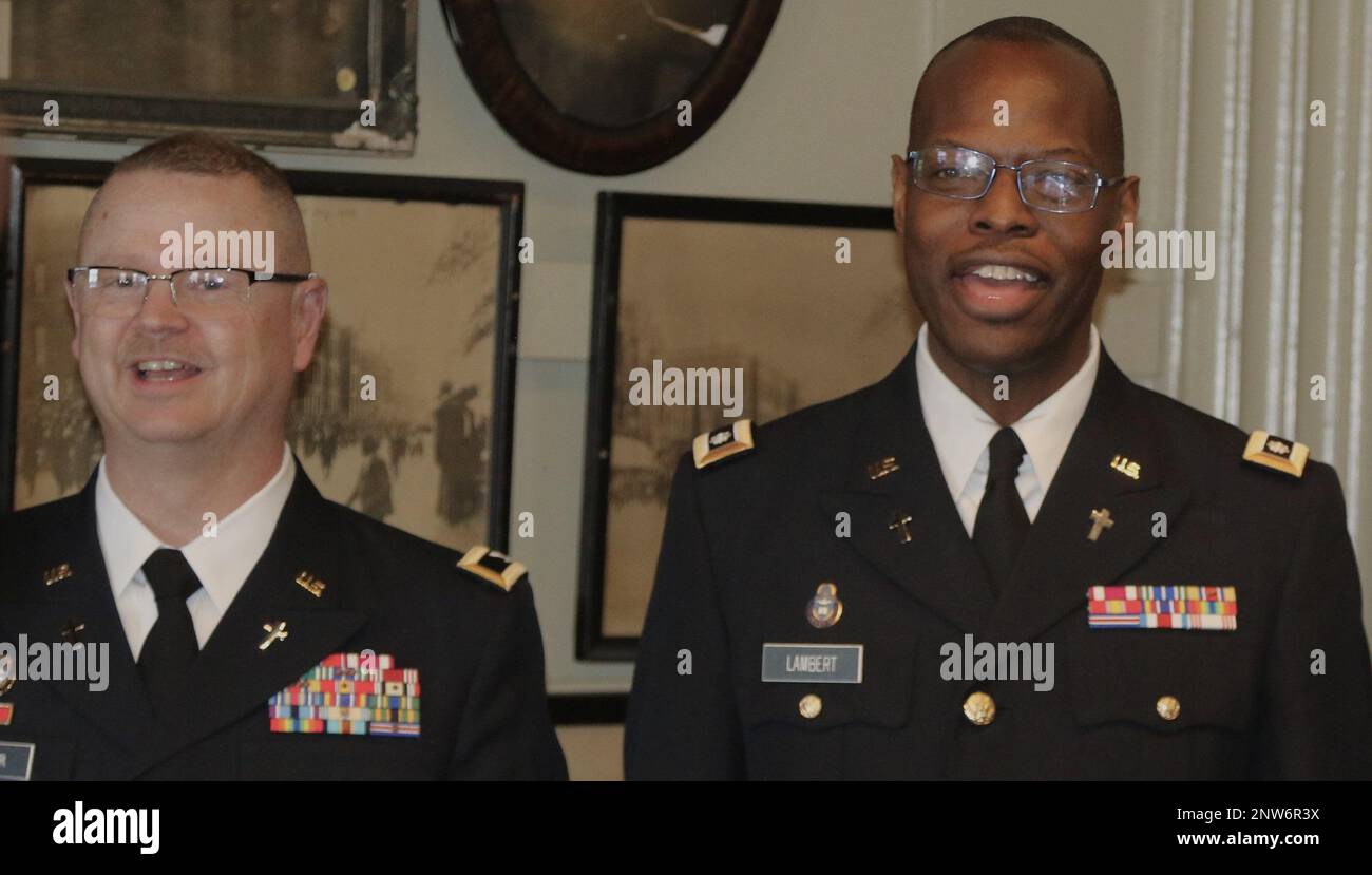 Illinois Army National Guard Chaplain (Lt. Col.) Vince Lambert sings the Army Song with Chaplain ...