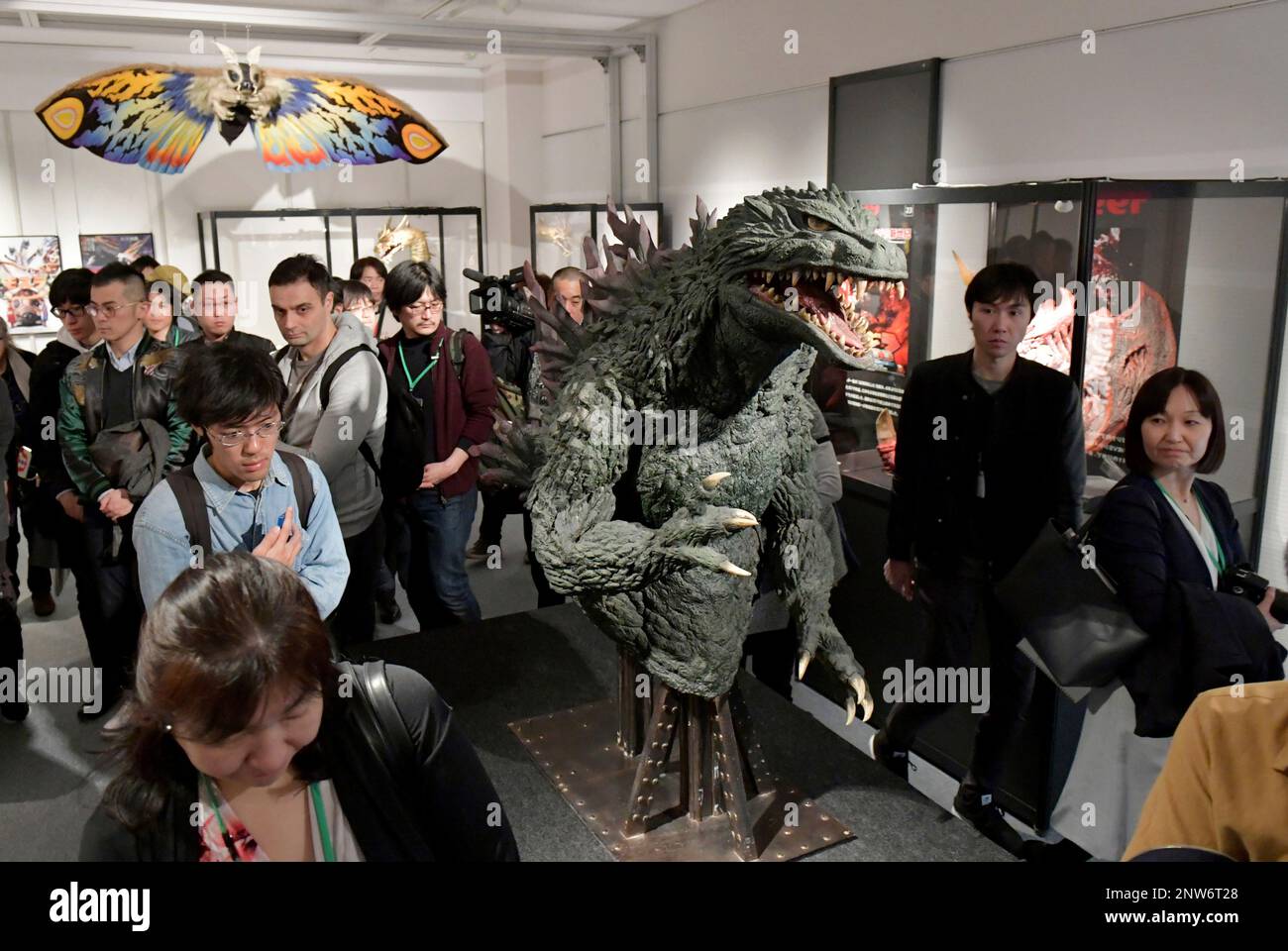 Godzilla costume and others are displayed during an exhibition ...