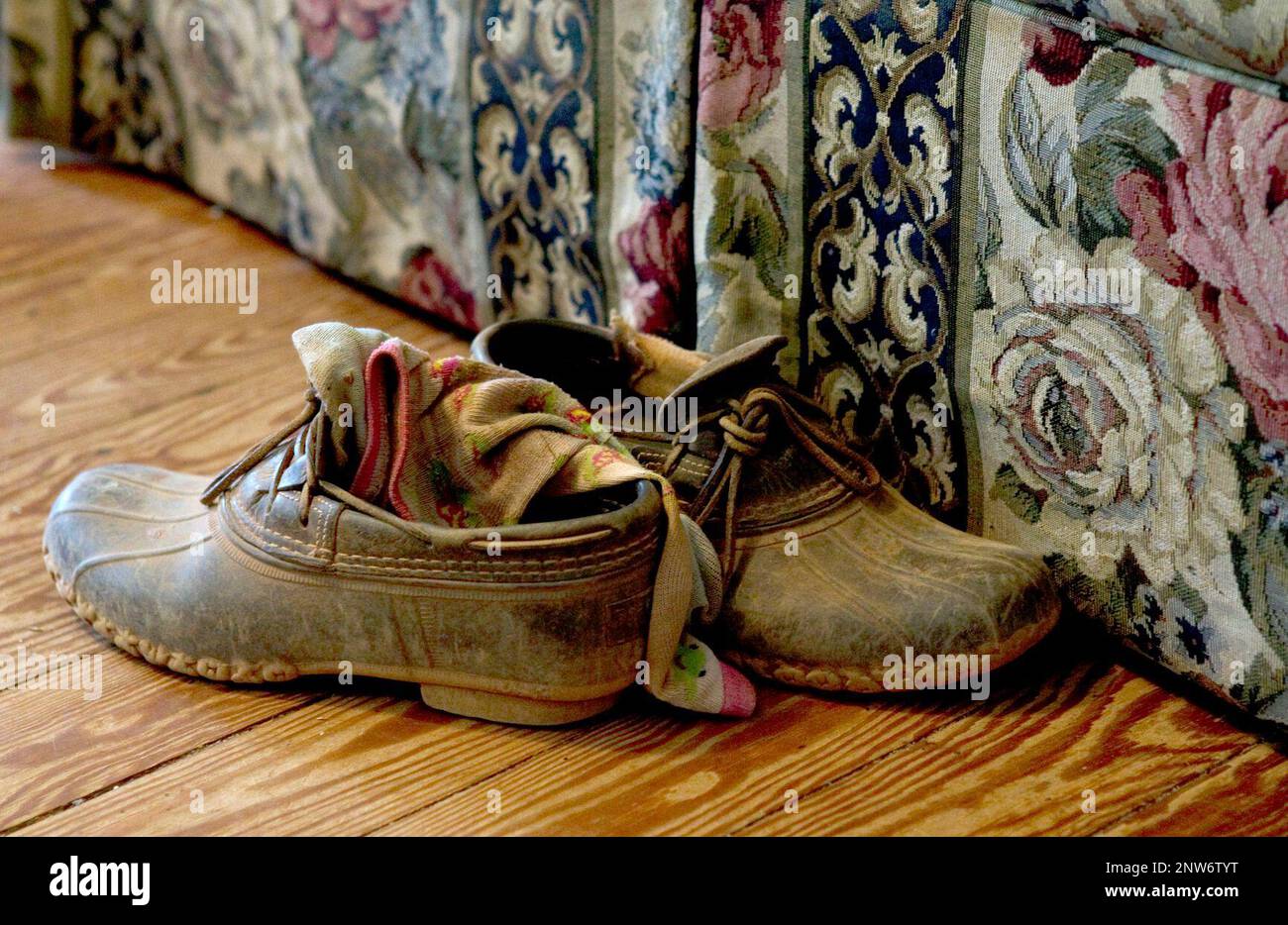 Sharon Angell's shoes rest by the couch during her lunch break from ...