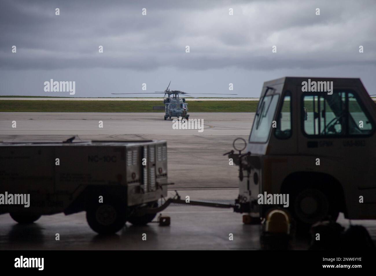 A U.S. Navy MH-60 Seahawk with Helicopter Sea Combat Squadron (HSC) 25 ...