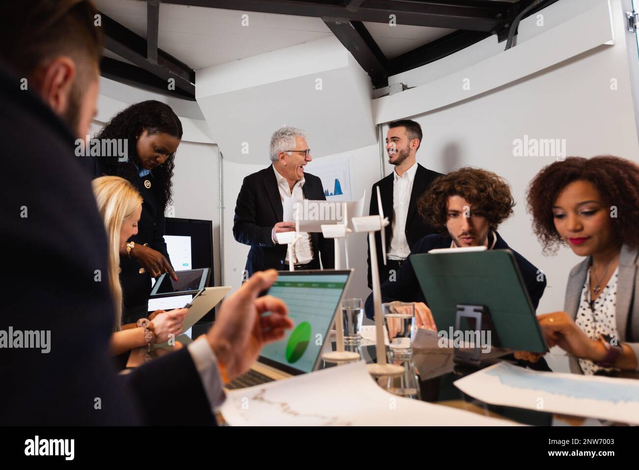 Large group of colleagues with diverse ethnicity working together on a ...