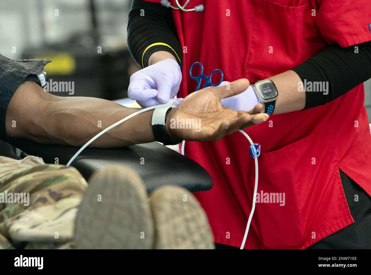 A volunteer is prepped before giving blood, Feb. 13. Fort Jackson and ...