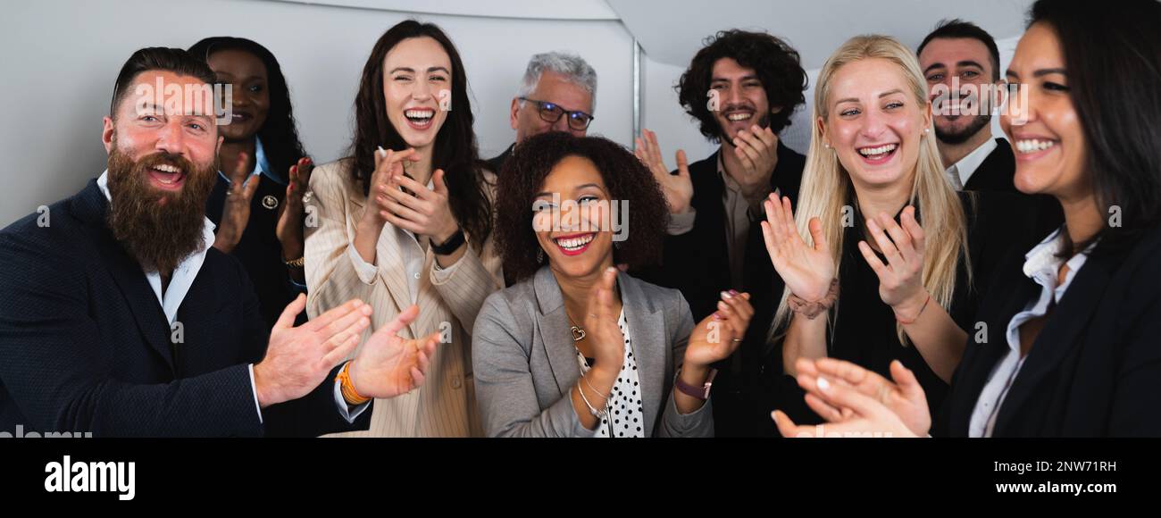 Diverse ethnicity group of colleagues clapping hands congratulating and ...