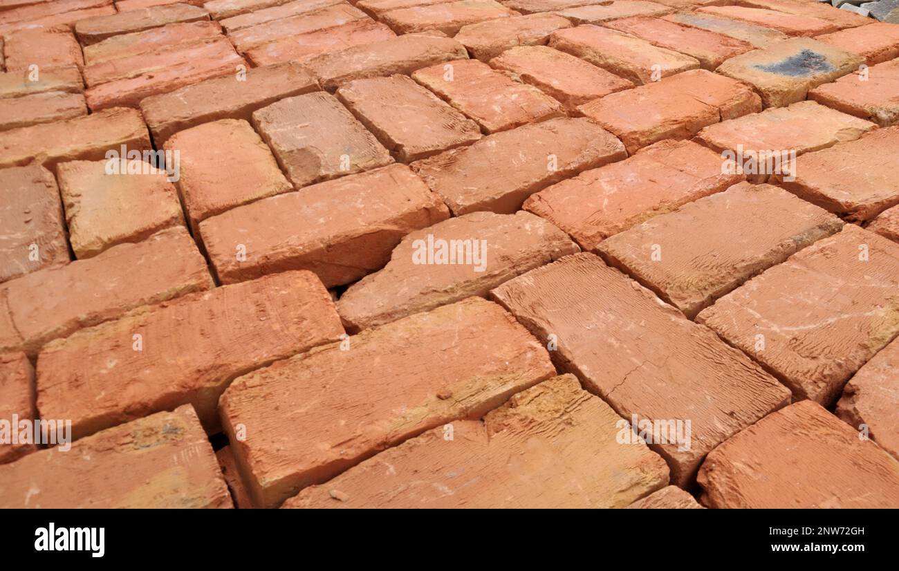 In the pile is a ready-made fired brick made of clay Stock Photo - Alamy