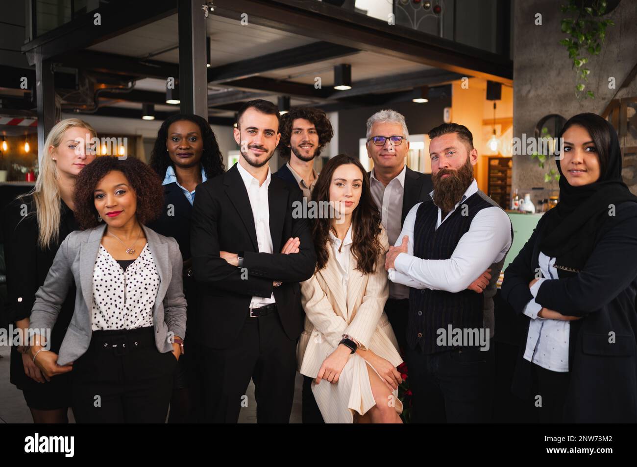 Large group of colleagues posing. Elegant business people with ...